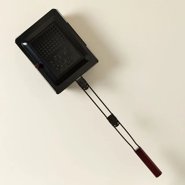 Uncommon Goods | Outdoor Popcorn Popper | campfire cooking