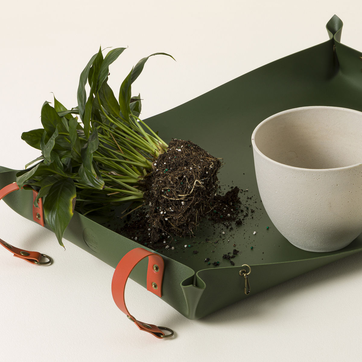 Uncommon Goods | Reusable Roll Up Potting Mat | Gardening tools