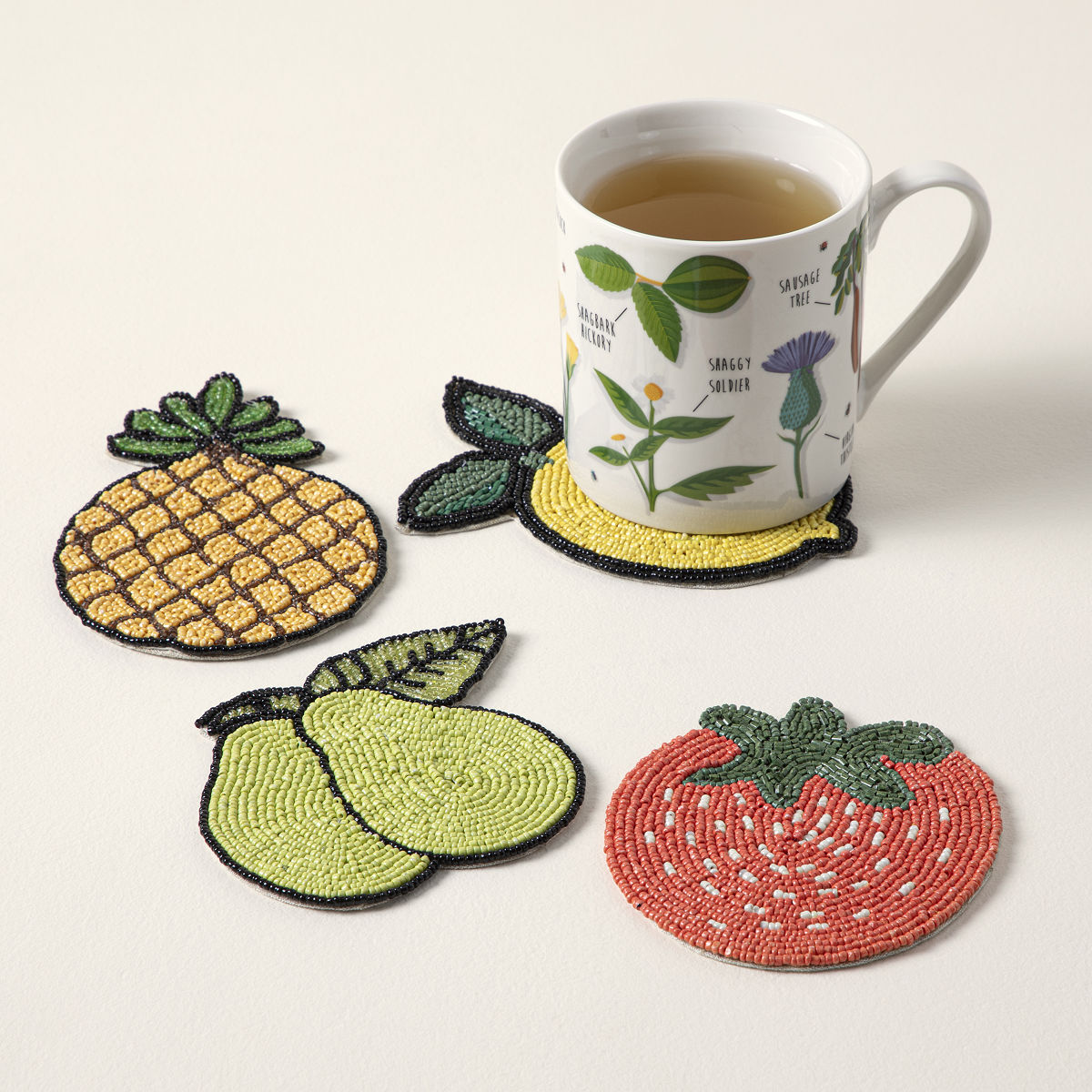 Uncommon Goods | Beaded Fruit Coasters – Set of 4 | Coasters