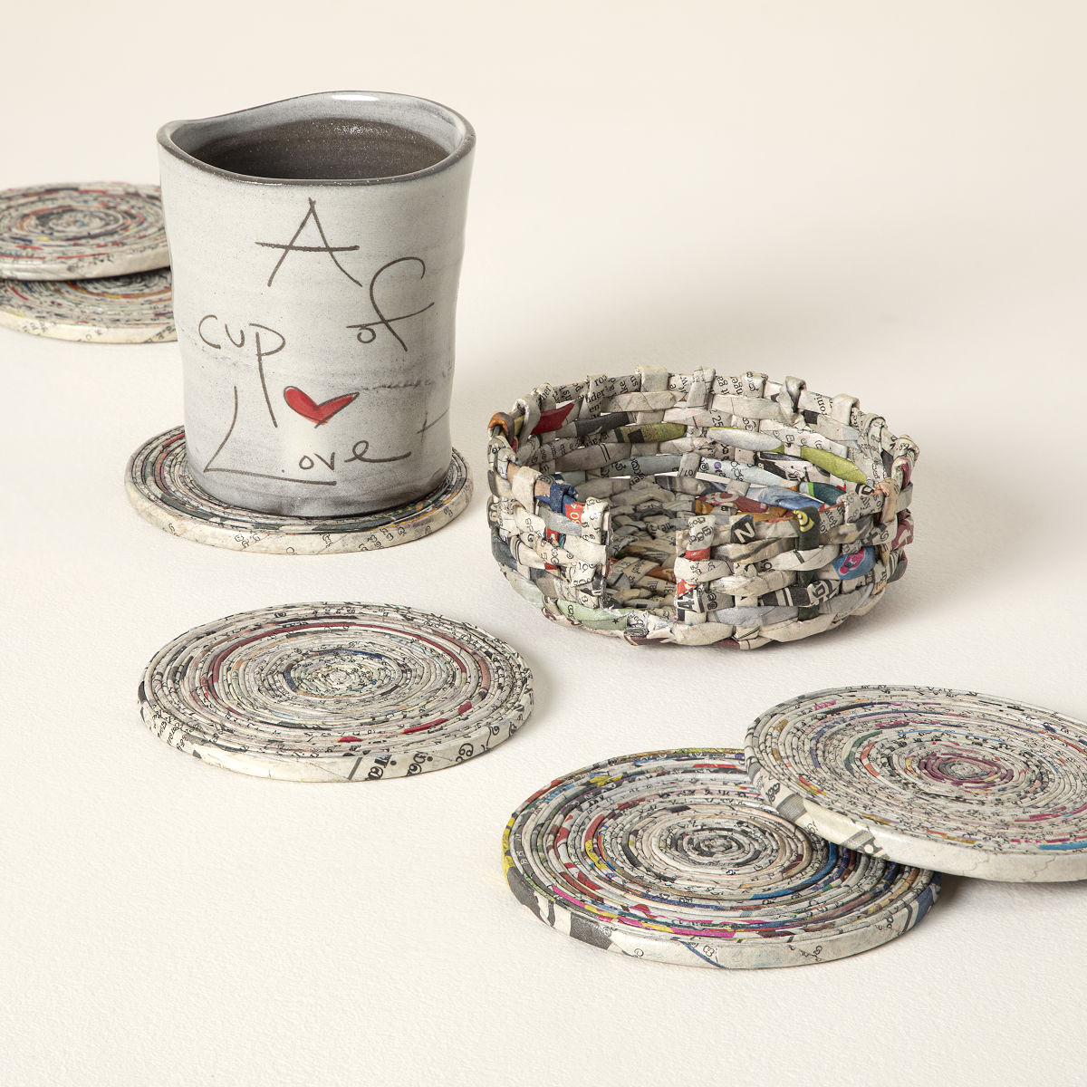 Uncommon Goods | Upcycled Newspaper Coaster Set | Coasters